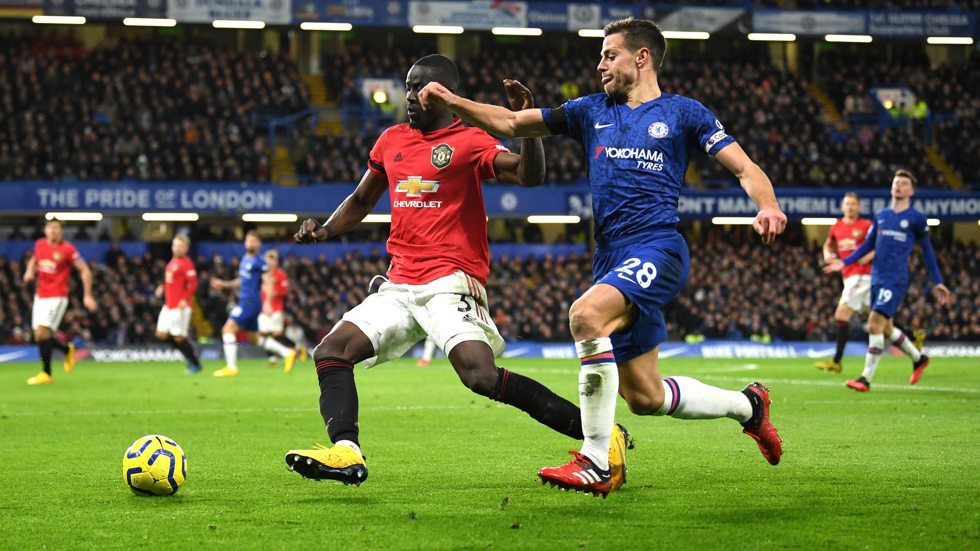 Split screen action Eric Bailly tackles v Chelsea | Manchester United