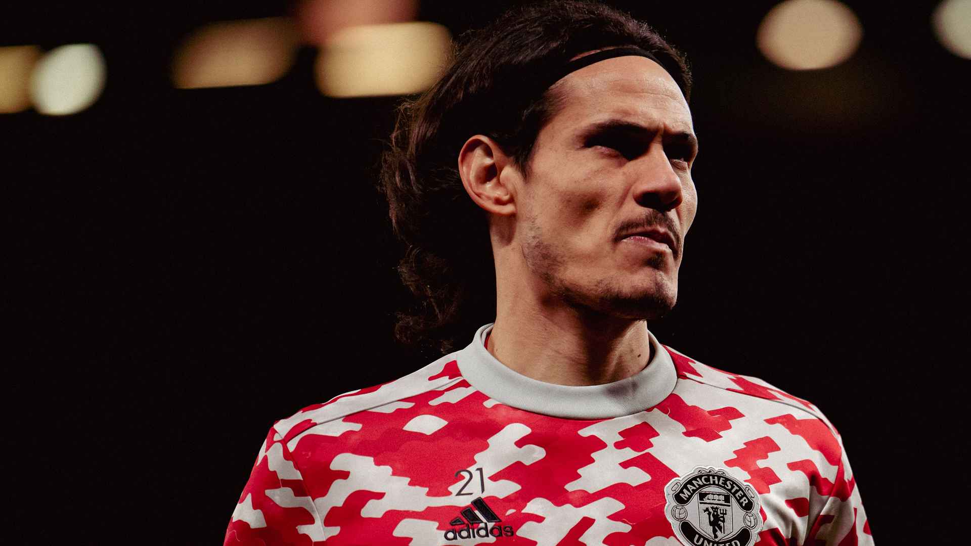 Man Utd striker Edinson Cavani checks on ball assistant at Old Trafford ...