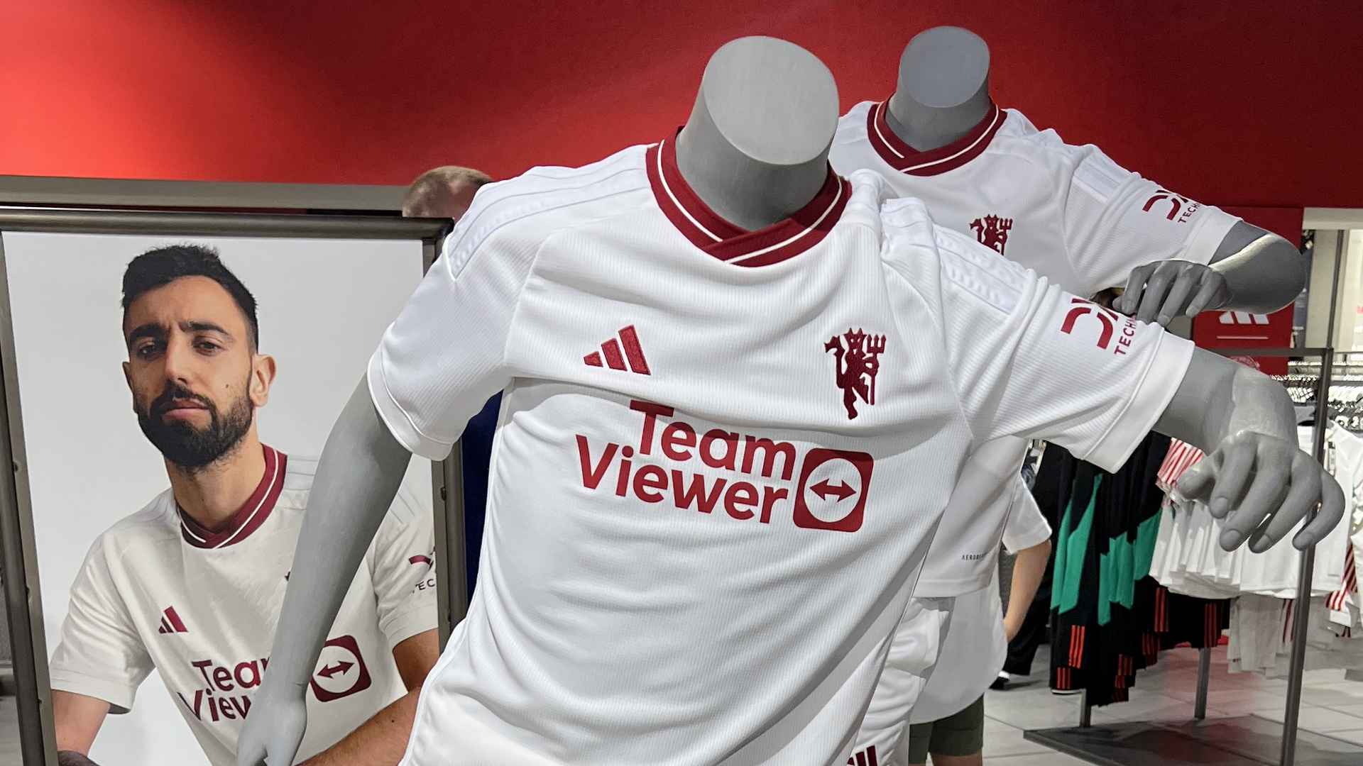 Gallery of Man Utd 2023 24 third shirt in the Megastore | Manchester United