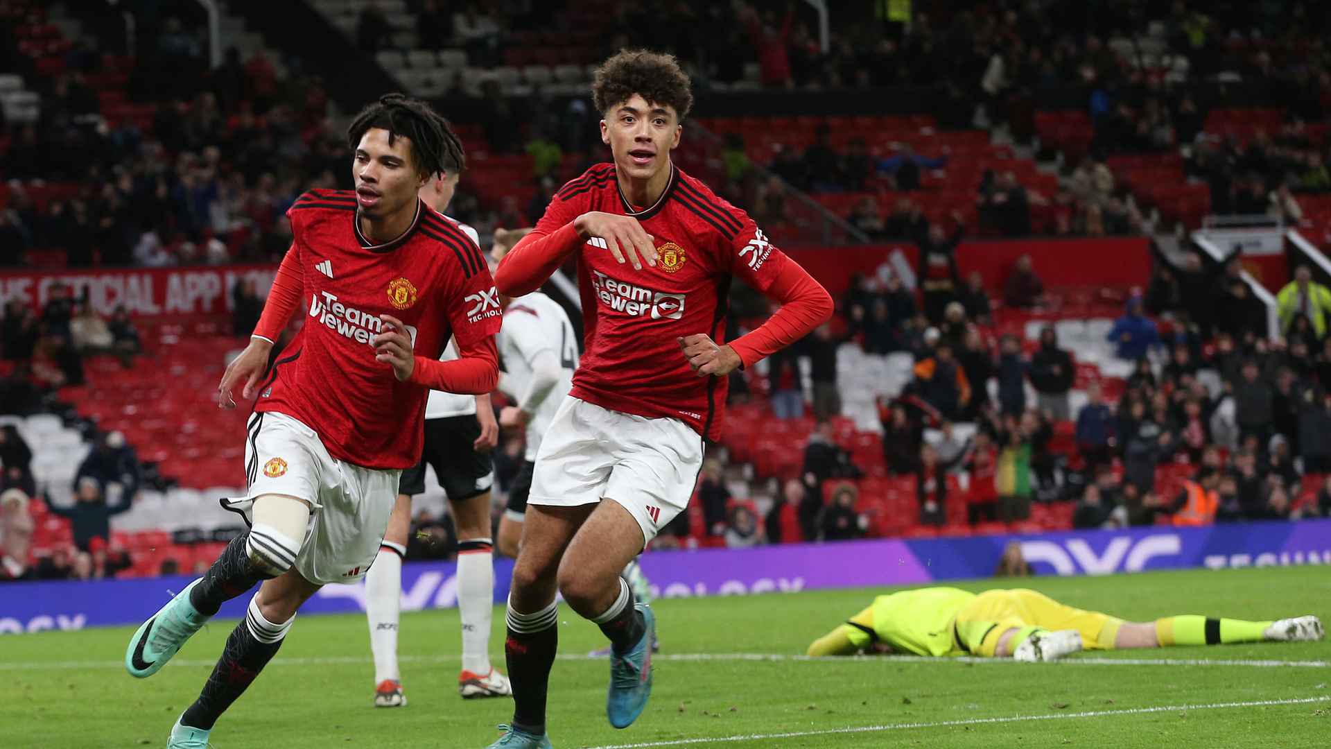 Man Utd Under-18s coach Adam Lawrence and players Jack Kingdon and ... Man Utd Under-18s coach Adam Lawrence and players Jack Kingdon and ...