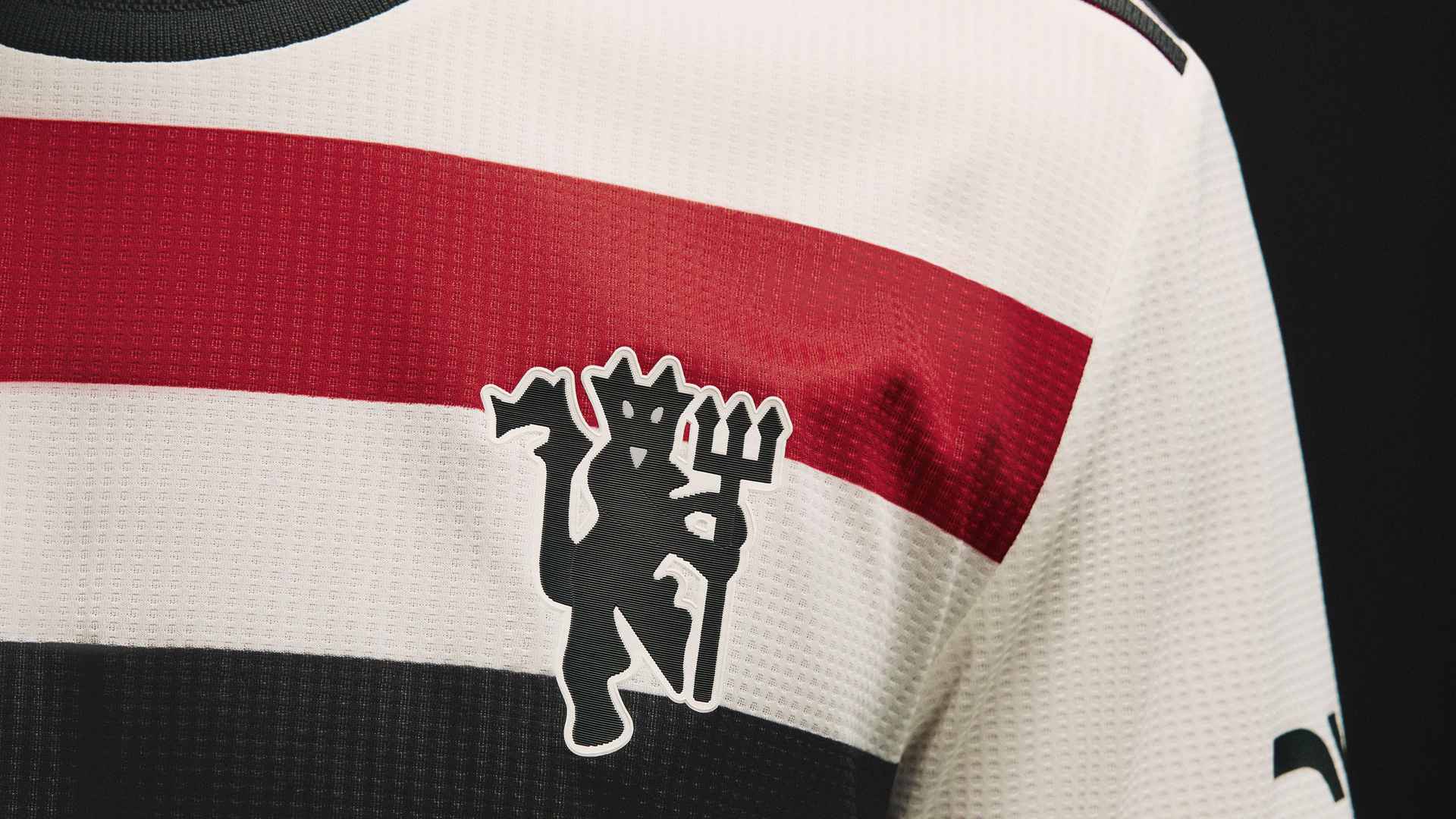 Old Trafford Megastore 2024 25 third kit sleeves | Manchester United