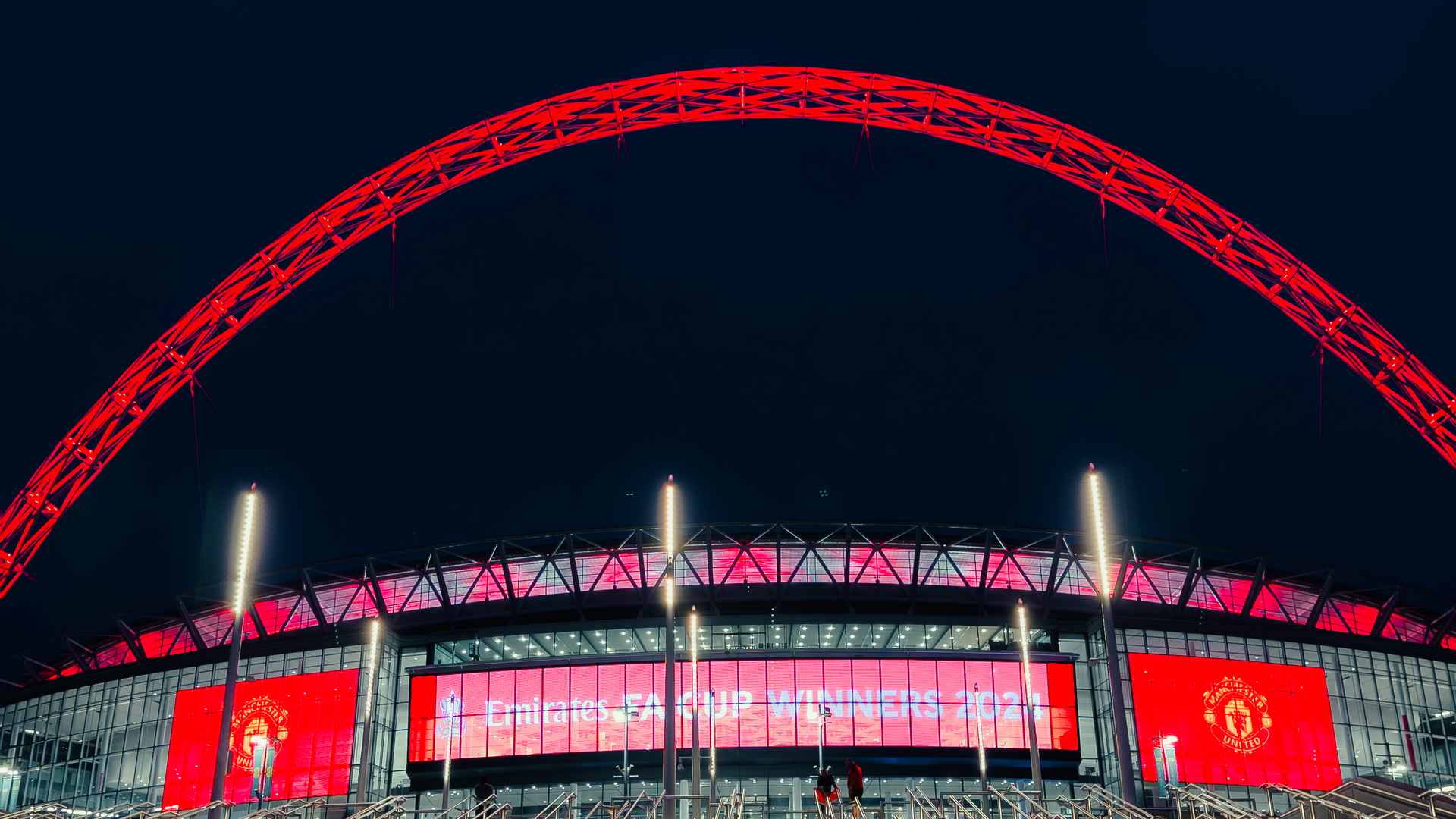 Gallery of pictures of Wembley arch lit up red after 2024 FA Cup final ...